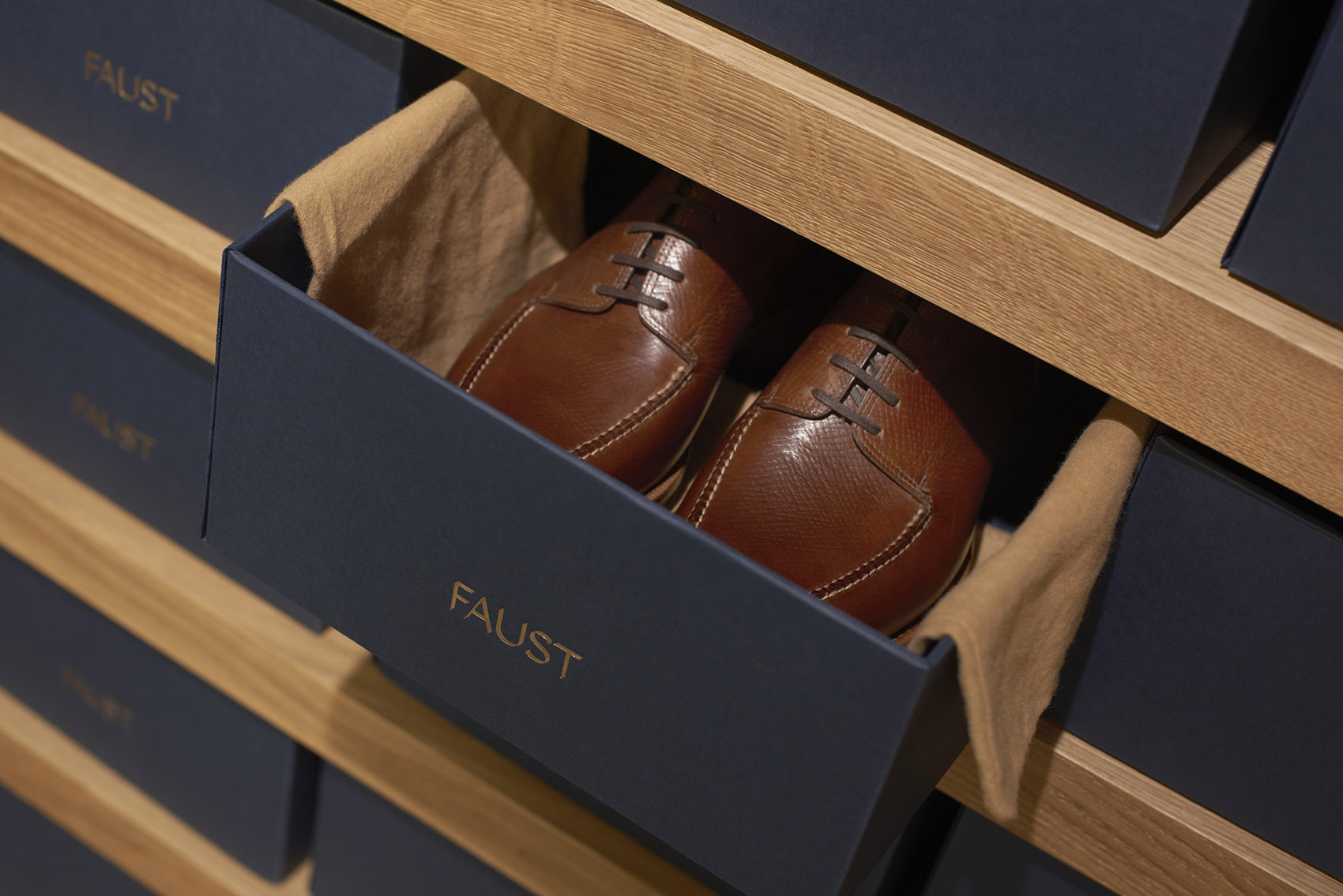 Signature store and visual identity design for Faust, Norway by ...