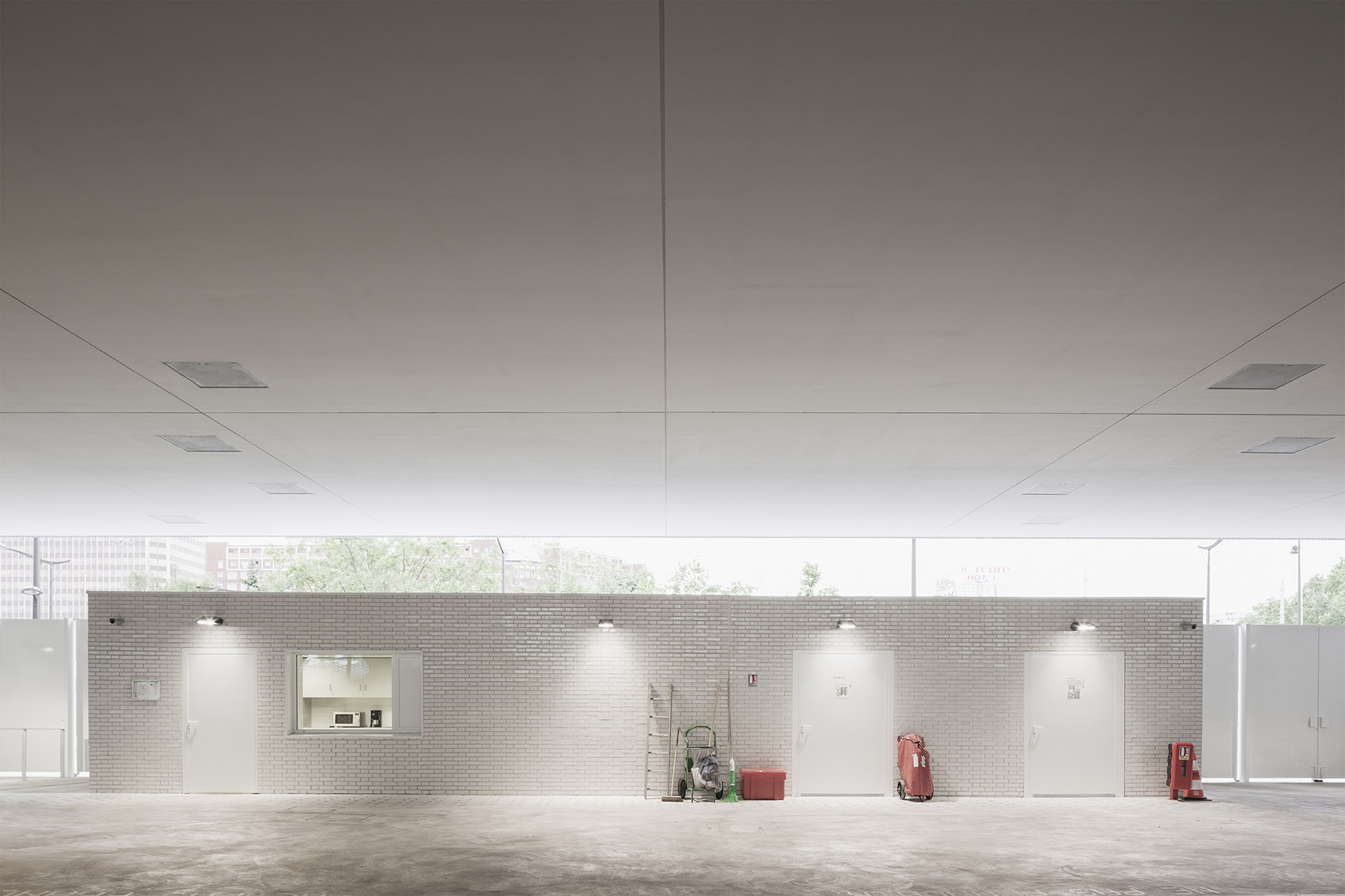 A waste sorting centre beneath the ring-road by DATA Architectes - 谷德设计网