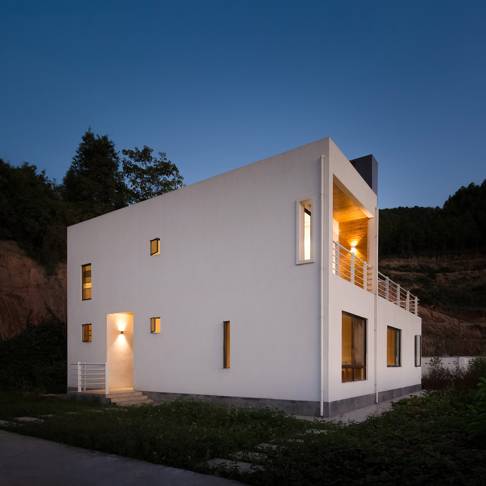 A White Hillside House by Ming Ding Spatial Art Studio - 谷德设计网