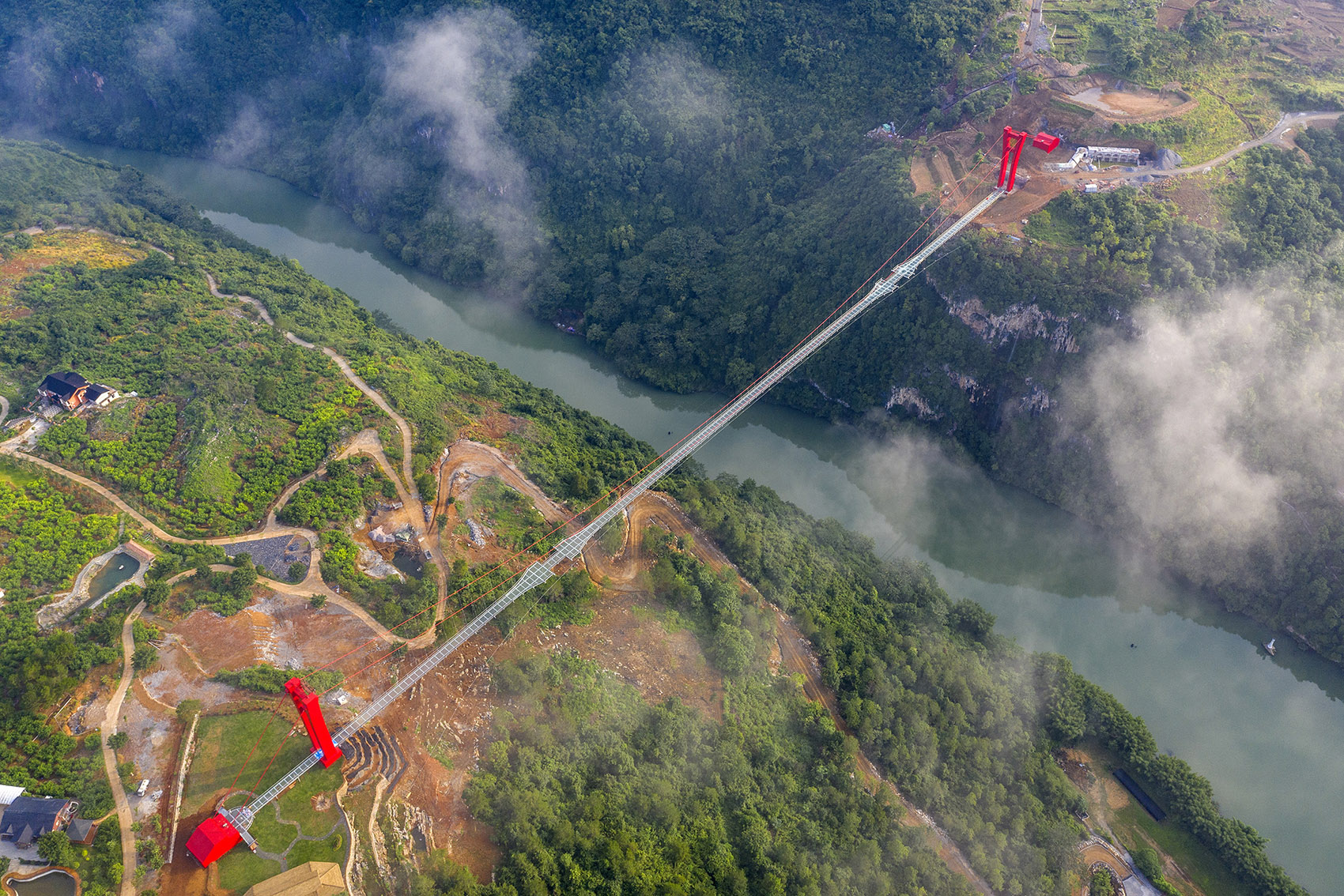 Glass Bridge in Huangchuan Three Gorges Scenic Area, China by UAD - 谷德设计网
