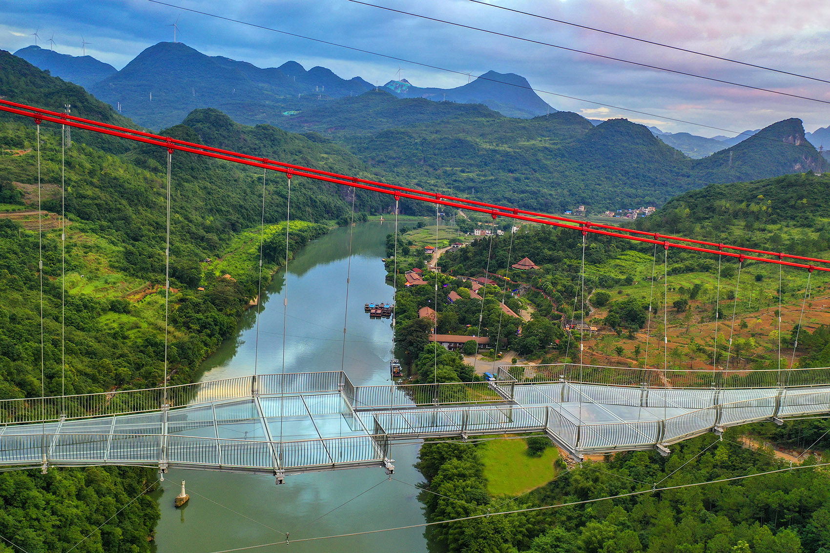 Glass Bridge in Huangchuan Three Gorges Scenic Area, China by UAD - 谷德设计网