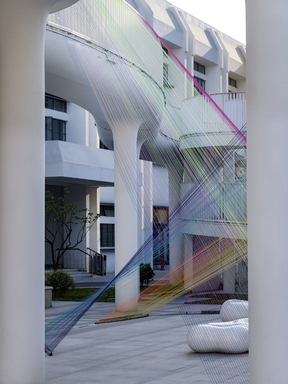 Jiangnan District Embroidered Garment Factory, China by MINAX - 谷德设计网