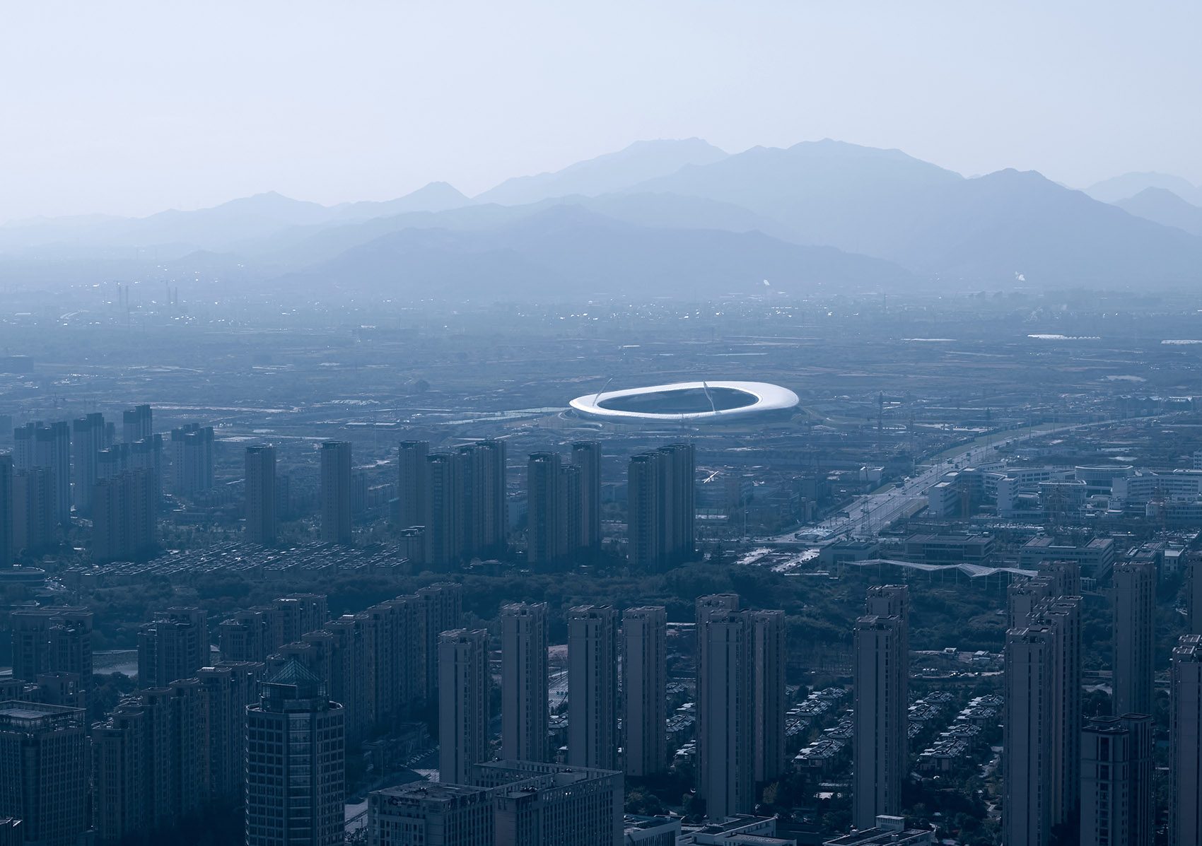 MAD Architects Completes the World’s Largest Earth-sheltered Stadium ...
