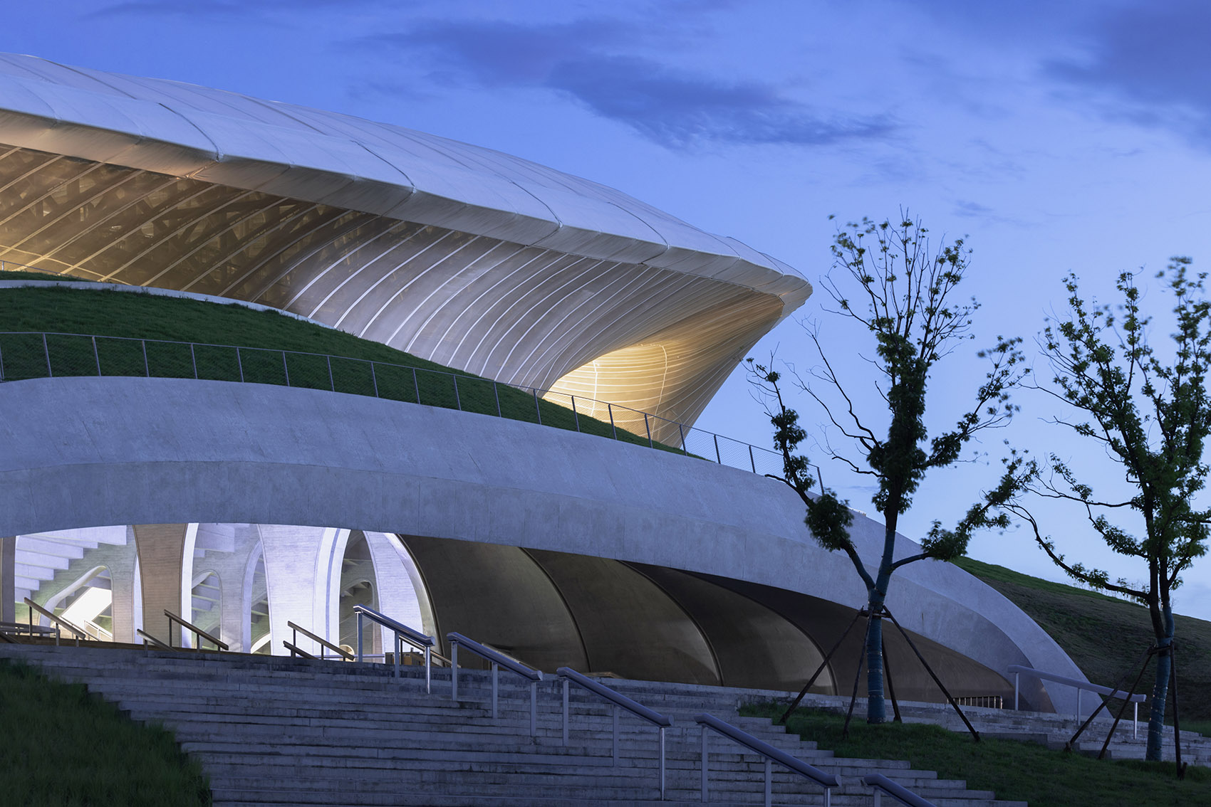MAD Architects Completes the World’s Largest Earth-sheltered Stadium ...