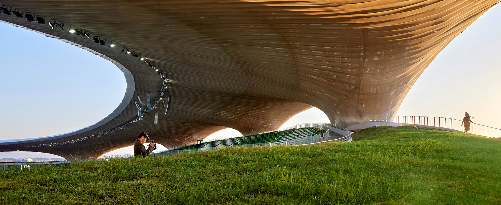MAD Architects Completes the World’s Largest Earth-sheltered Stadium ...