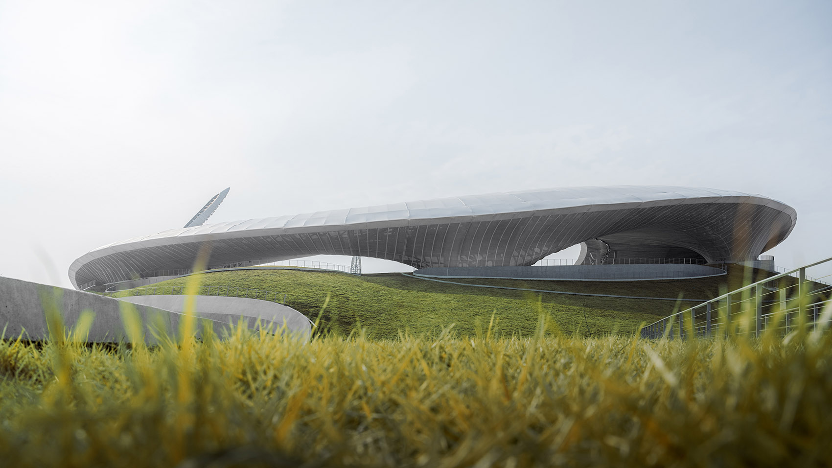 MAD Architects Completes the World’s Largest Earth-sheltered Stadium ...