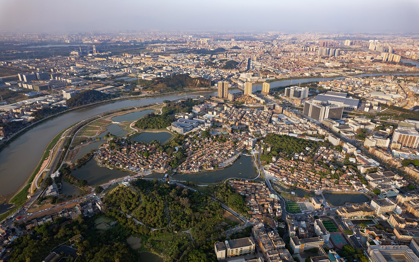 Organic renewal of the contiguous villages of Ding, Peng and Huang by ...