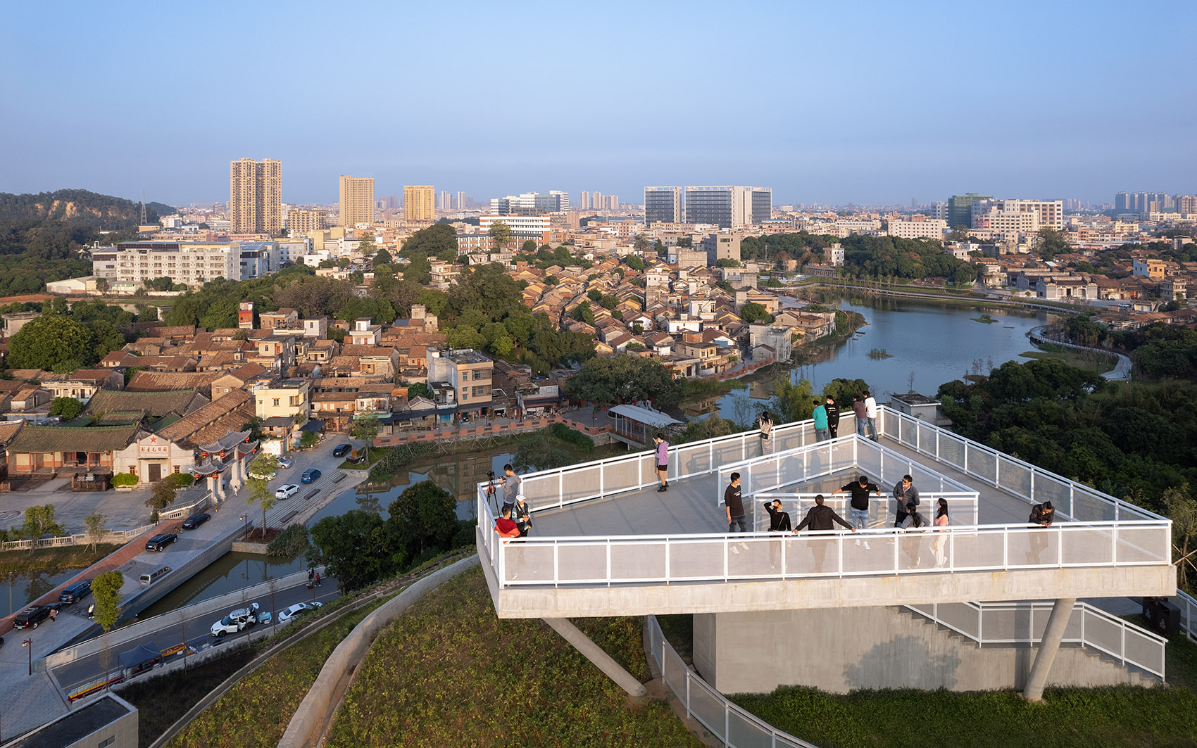 Organic renewal of the contiguous villages of Ding, Peng and Huang by ...