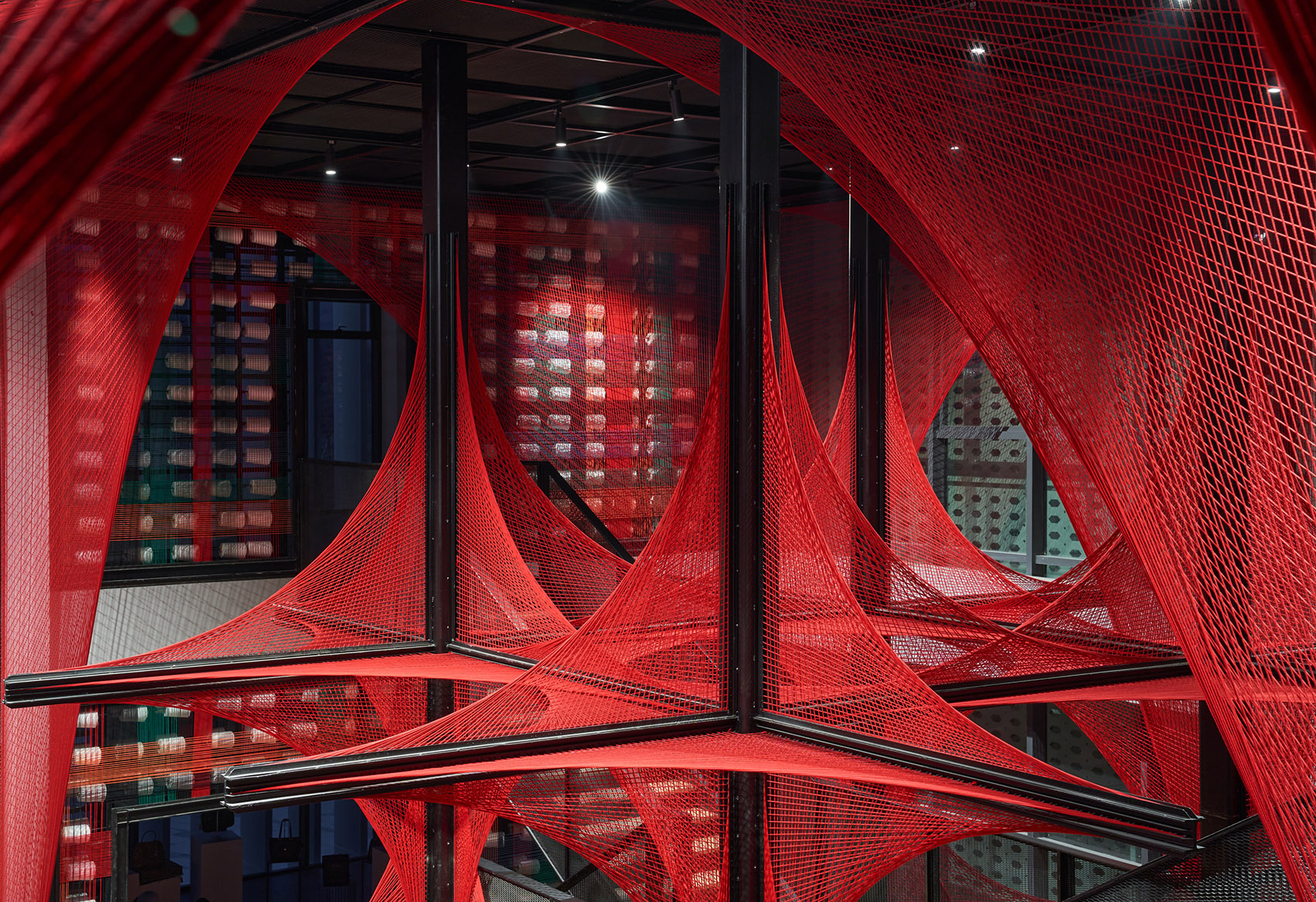 The Flower of Tujia at the China Tujia Brocade Art Museum by YI+MU Design Office - 谷德设计网