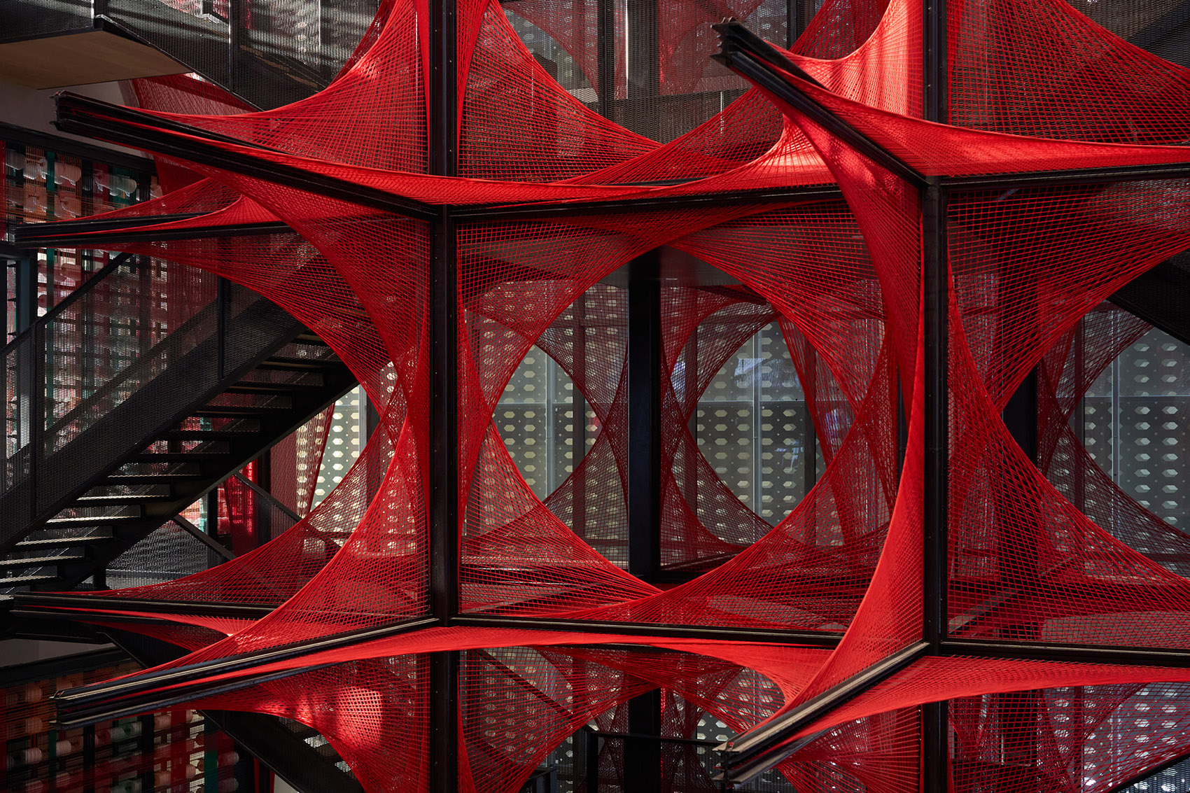 The Flower of Tujia at the China Tujia Brocade Art Museum by YI+MU Design Office - 谷德设计网