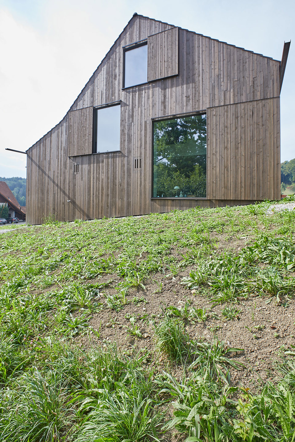 Residential barn in a hamlet zone by BE ARCHITEKTUR GMBH, Boris Egli dipl. Architekt FH REG A ...