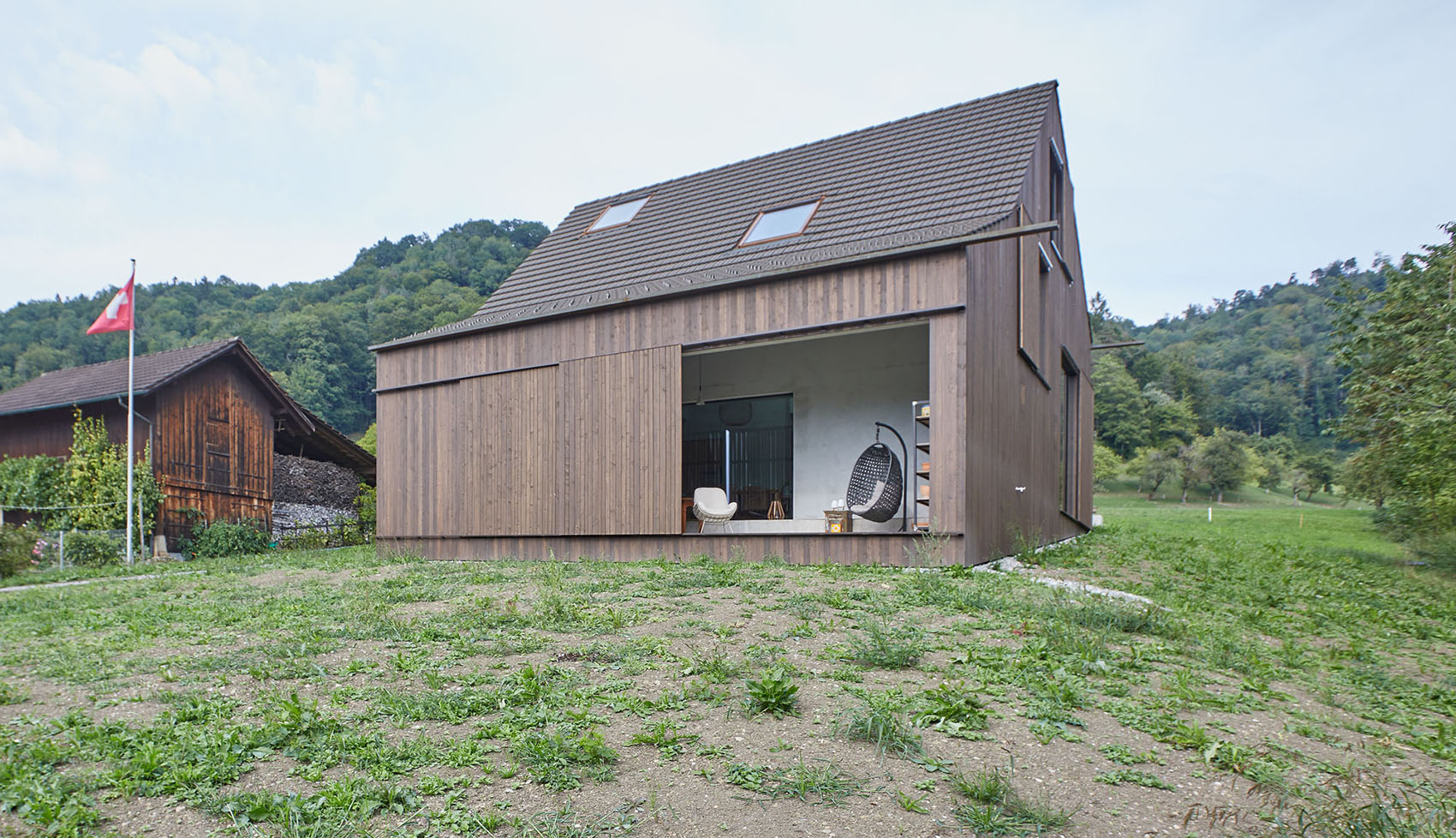 Residential barn in a hamlet zone by BE ARCHITEKTUR GMBH, Boris Egli dipl. Architekt FH REG A ...