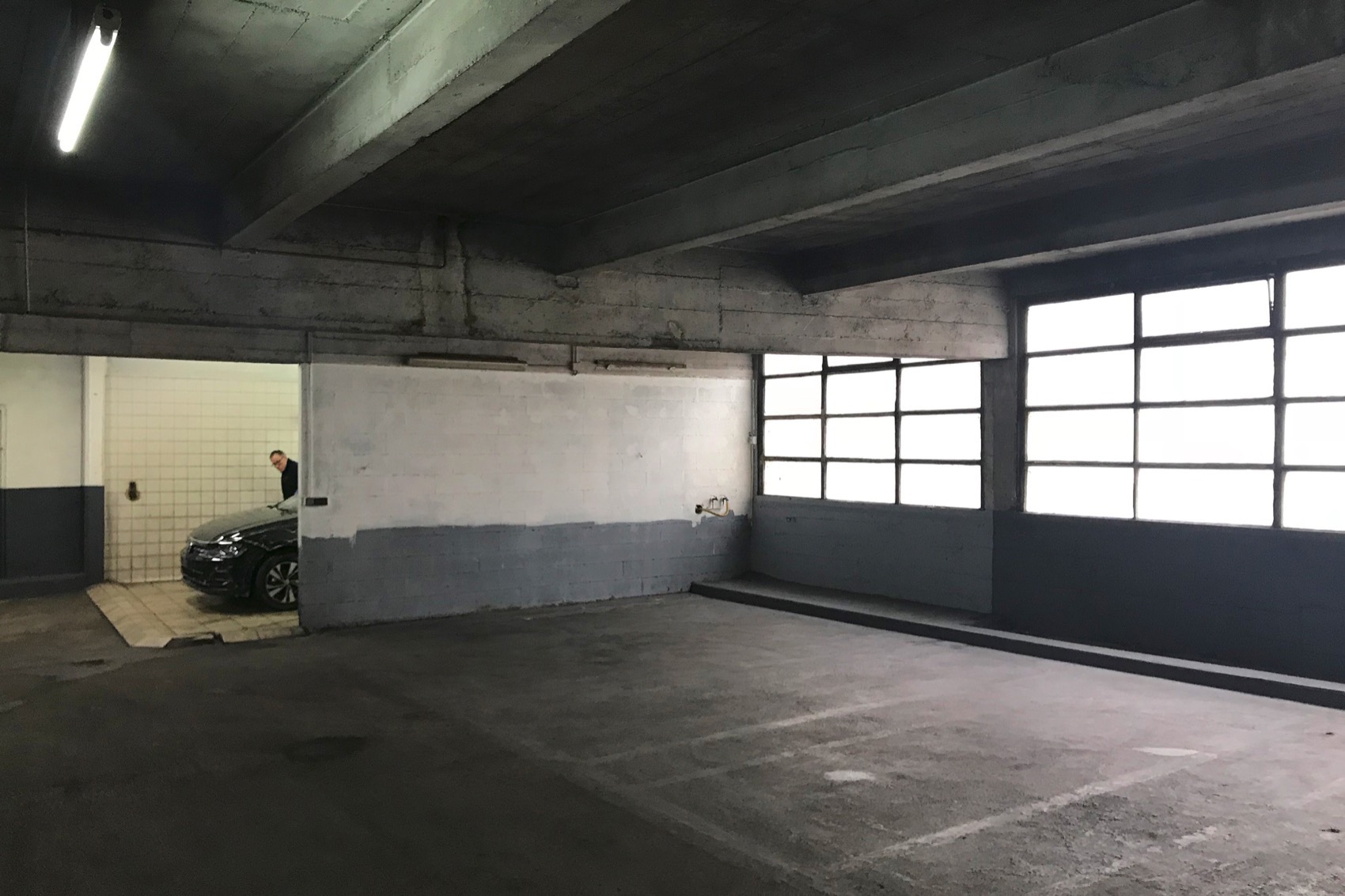 Transformation of an automobile garage into innovative offices and ...