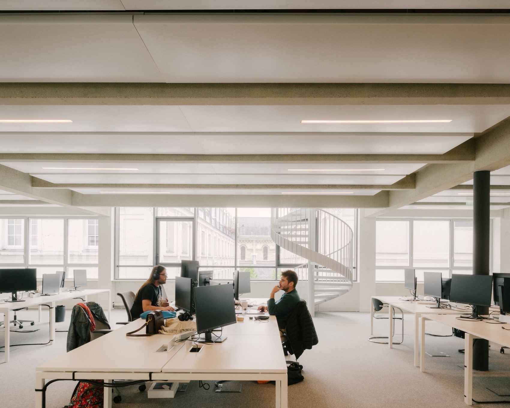 Transformation of an automobile garage into innovative offices and ...