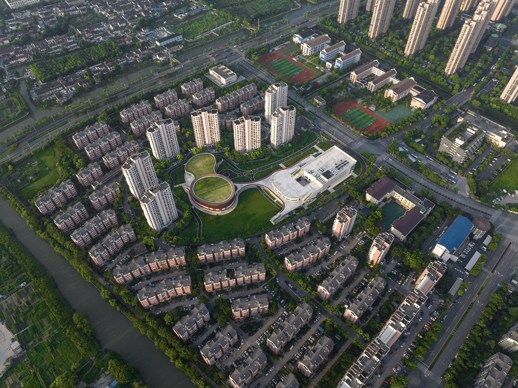 Shanghai Sanlin Yide Community Culture and Sports Center by SUNYAT ...