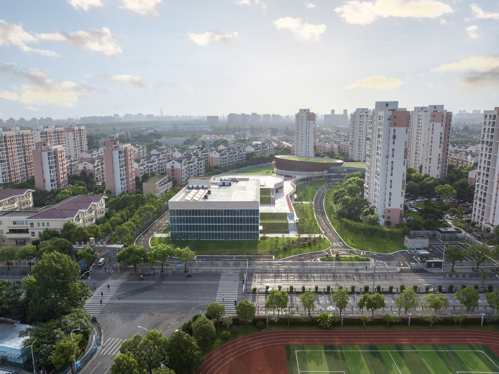 Shanghai Sanlin Yide Community Culture and Sports Center by SUNYAT ...