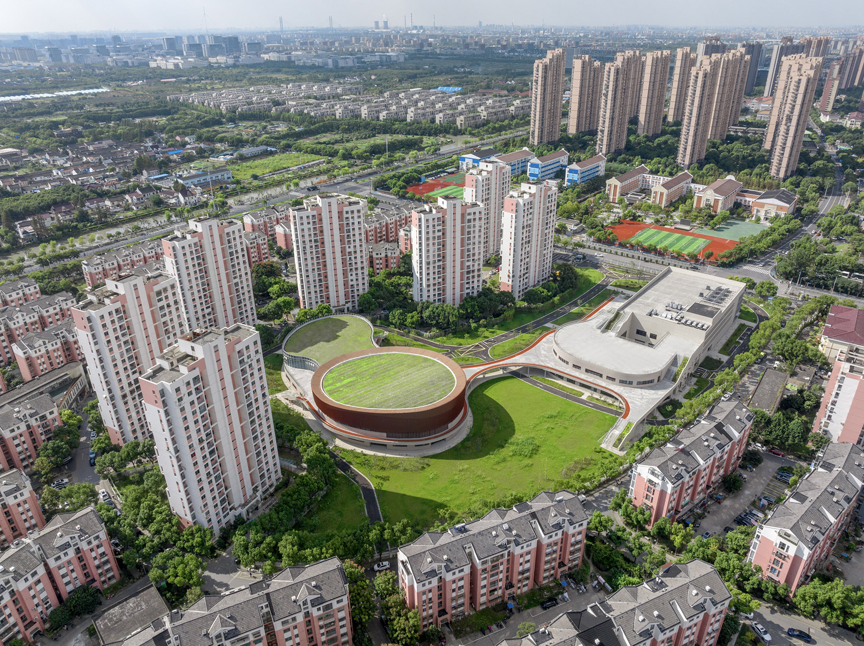 Shanghai Sanlin Yide Community Culture and Sports Center by SUNYAT ...