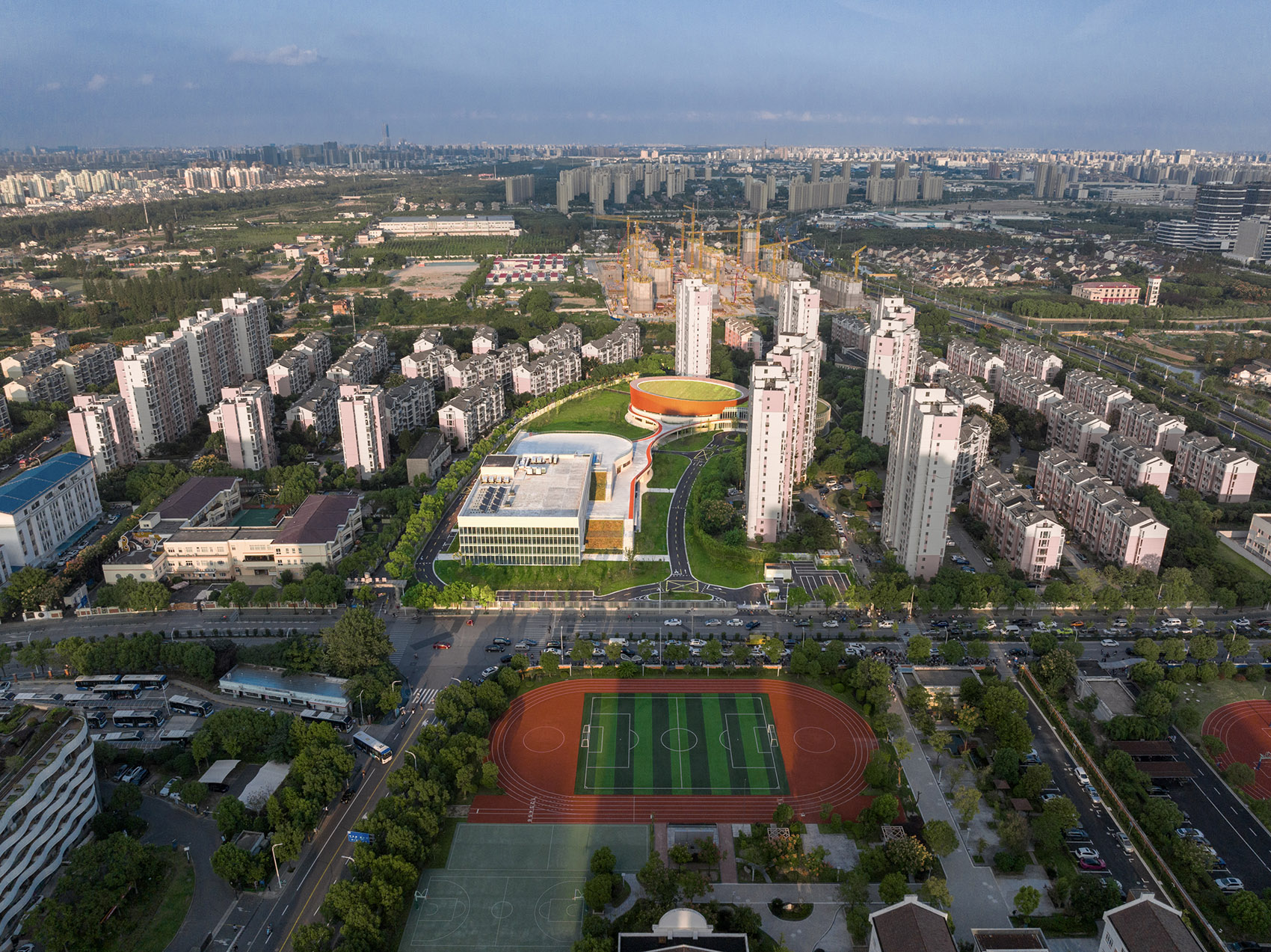Shanghai Sanlin Yide Community Culture and Sports Center by SUNYAT ...