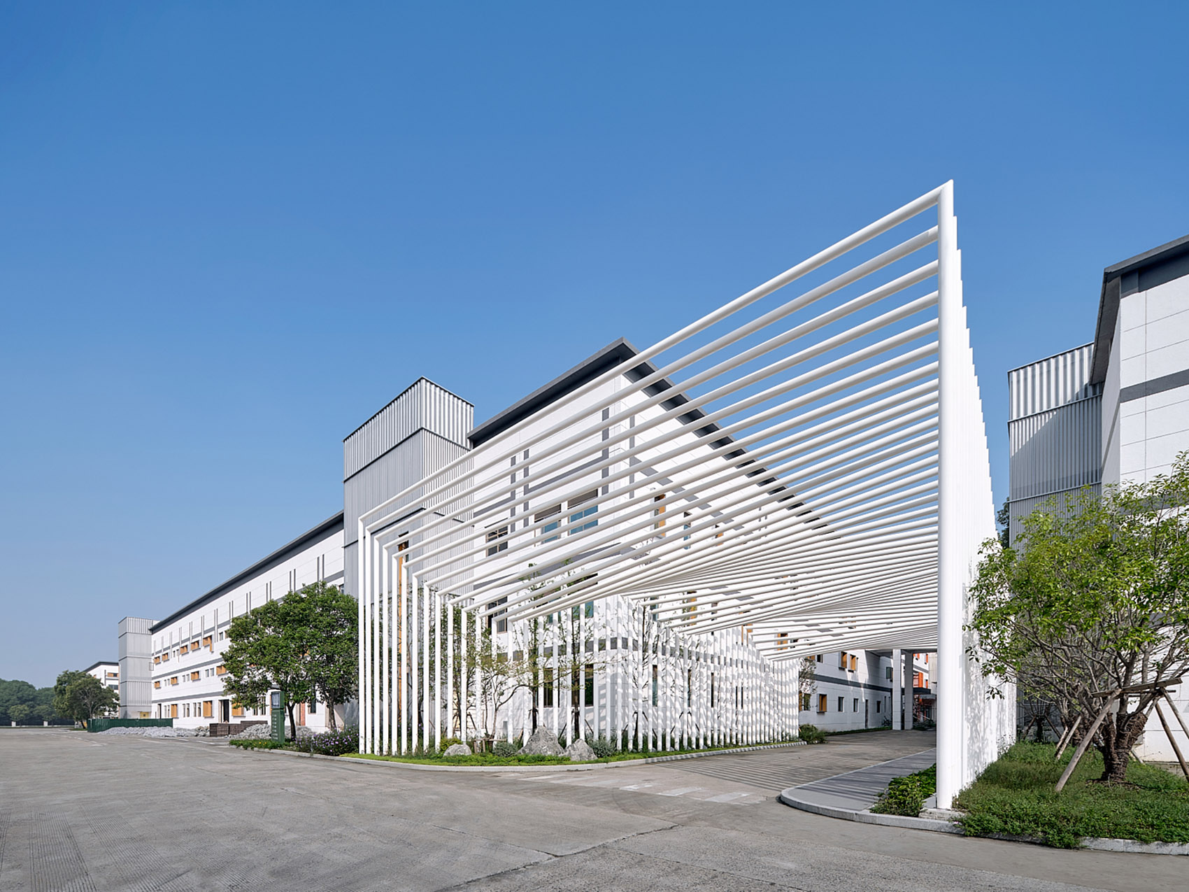 Renovation of Suzhou Xinda Industrial Park by Oumoumou Studio, School ...