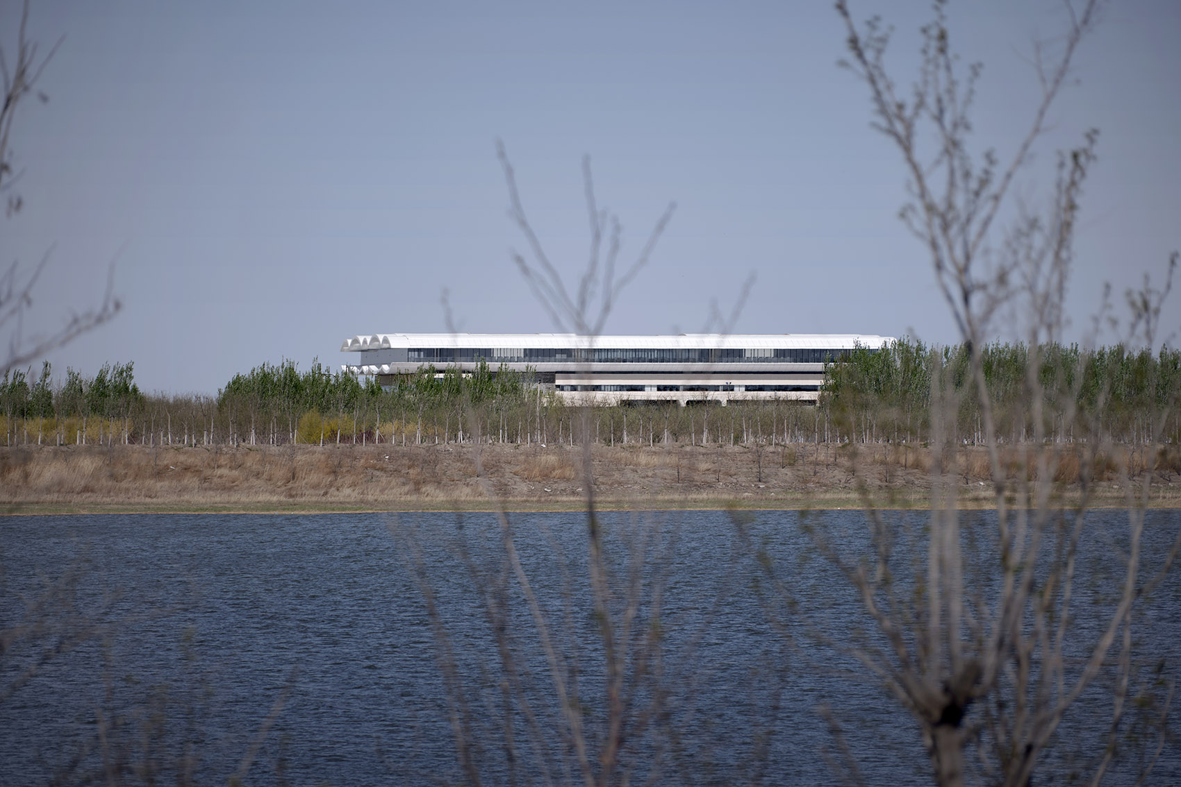 The new library and the school gate of CAUC by Original Design Studio ...
