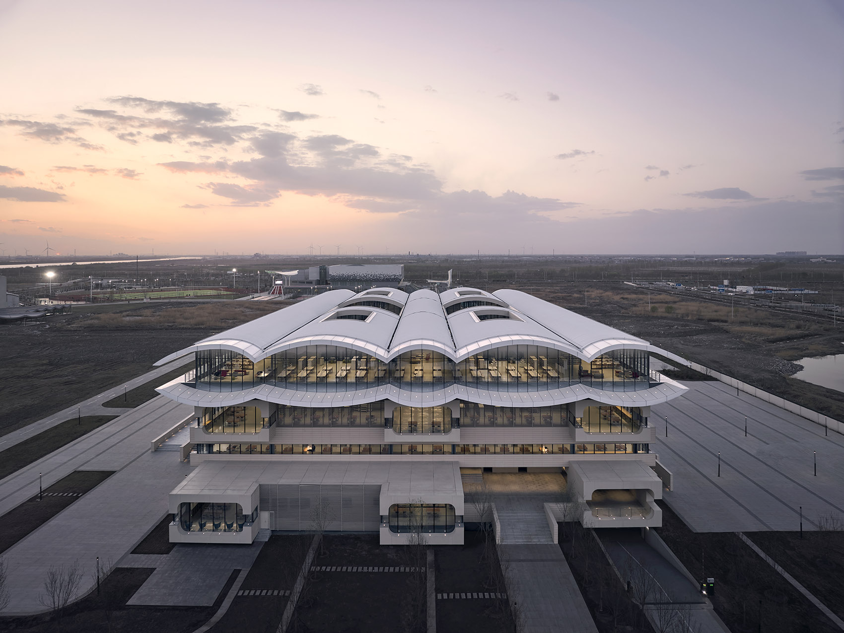 The new library and the school gate of CAUC by Original Design Studio ...