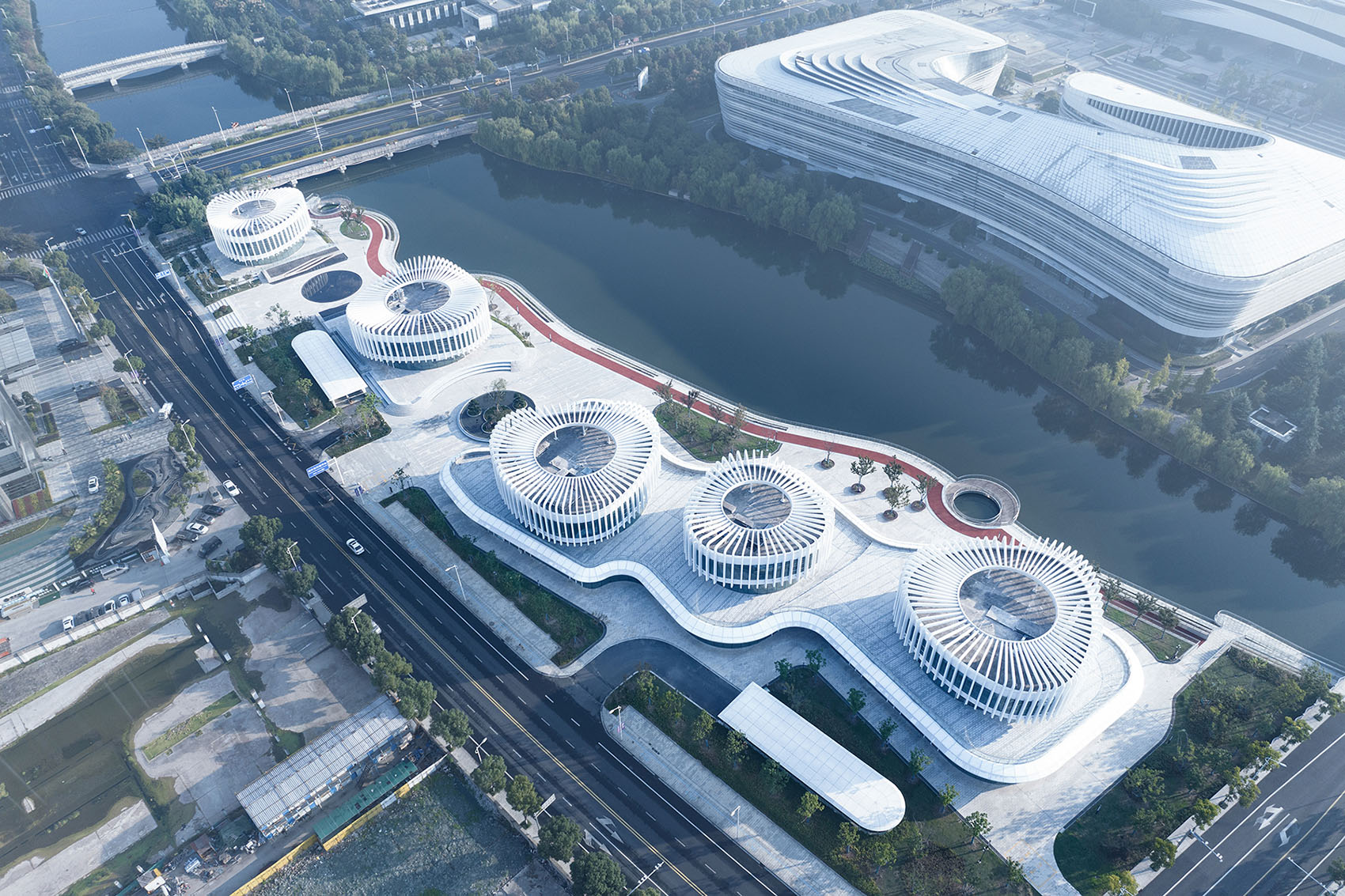 The Orchids:Nine Flow Riverside Art Mall by United Units Architects - 谷德设计网