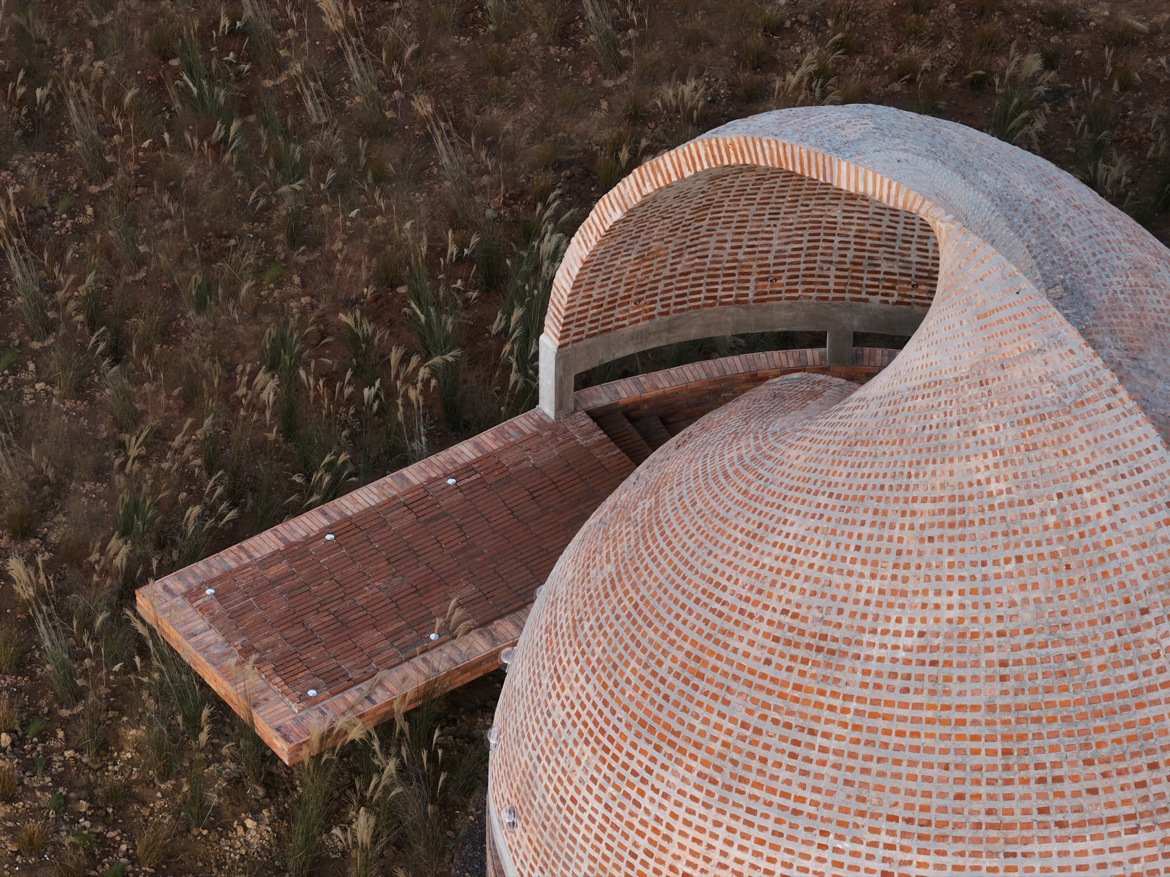 Twisted Brick Shell Concept Library by HCCH Studio - 谷德设计网