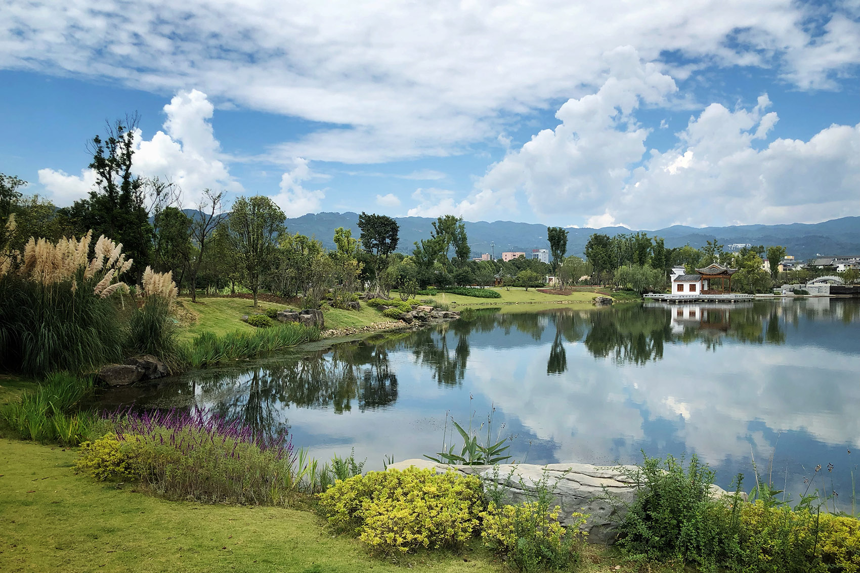 Youdian River Park System in Core Town Area by yǒu Landscape - 谷德设计网