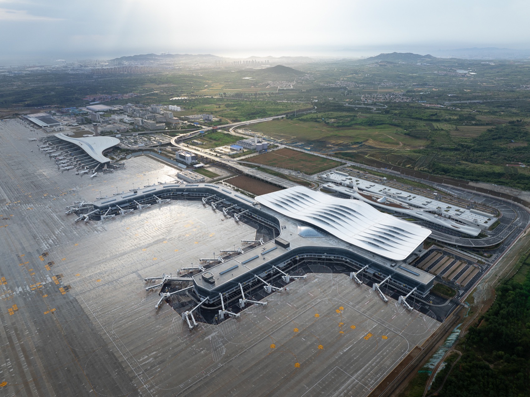 Yantai Penglai International Airport Terminal 2, China by CSWADI ...