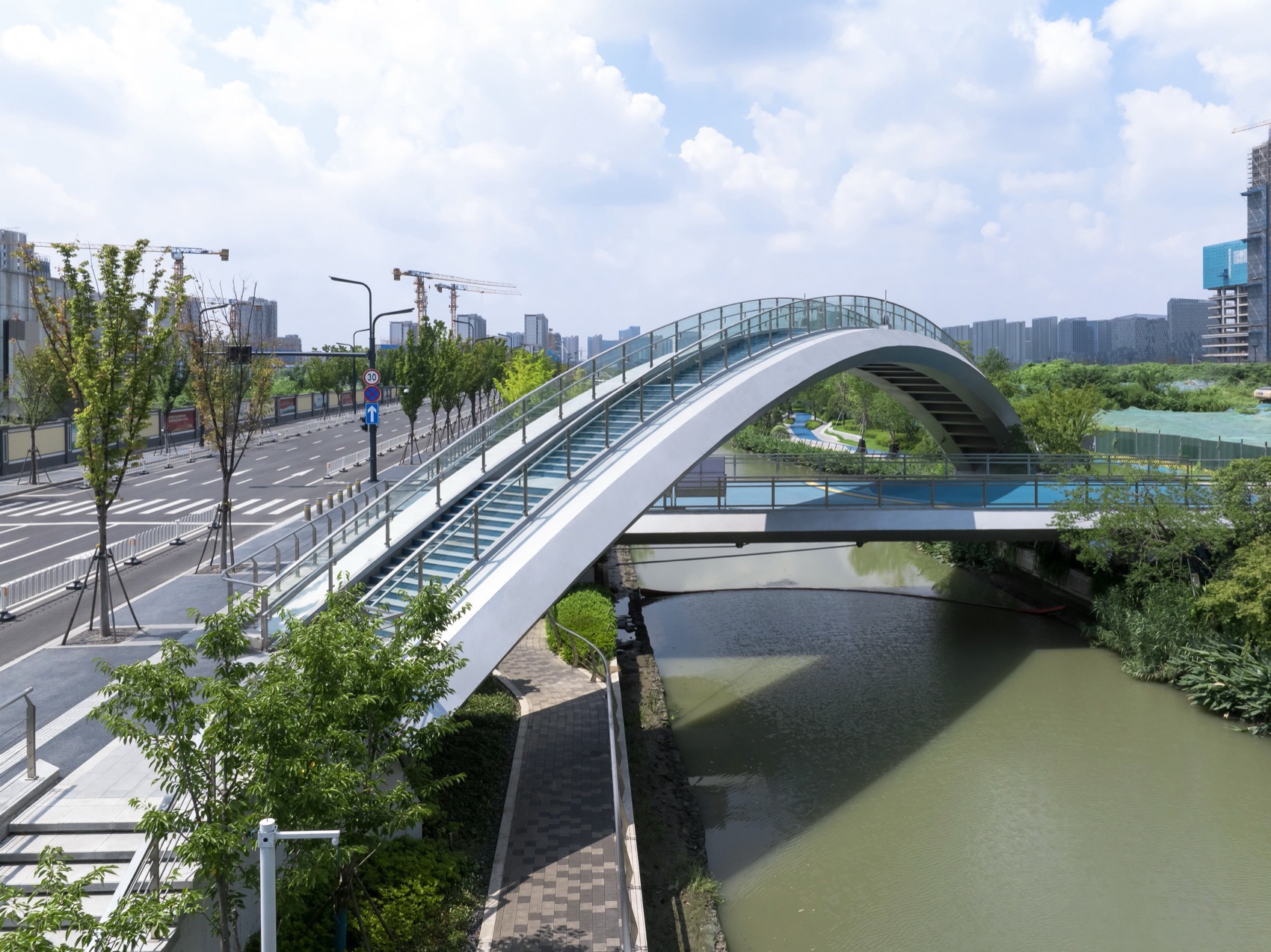 Pedestrian and vehicular bridges for Nanjing’s Nanbu New Town by NAN ...