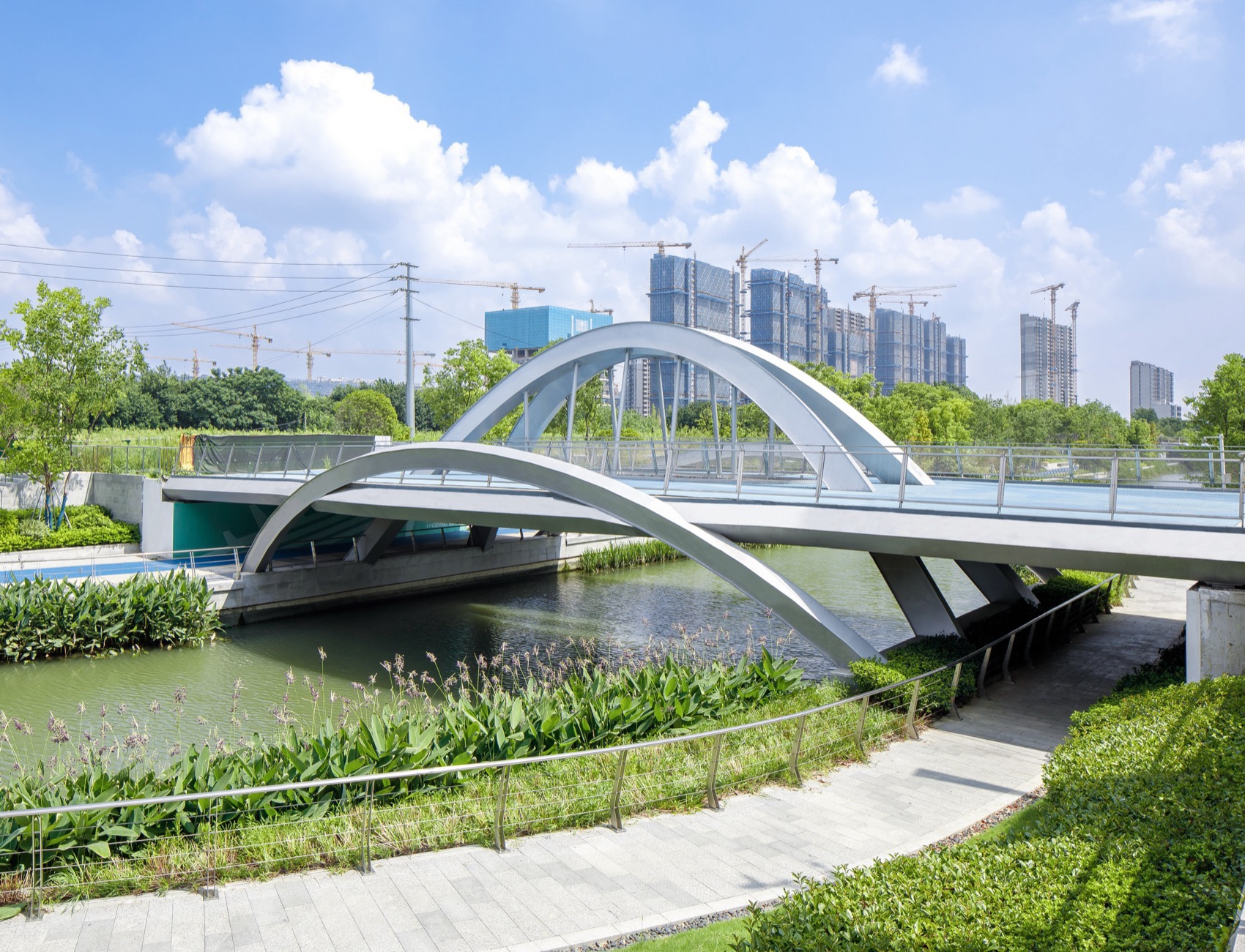 Pedestrian and vehicular bridges for Nanjing’s Nanbu New Town by NAN ...