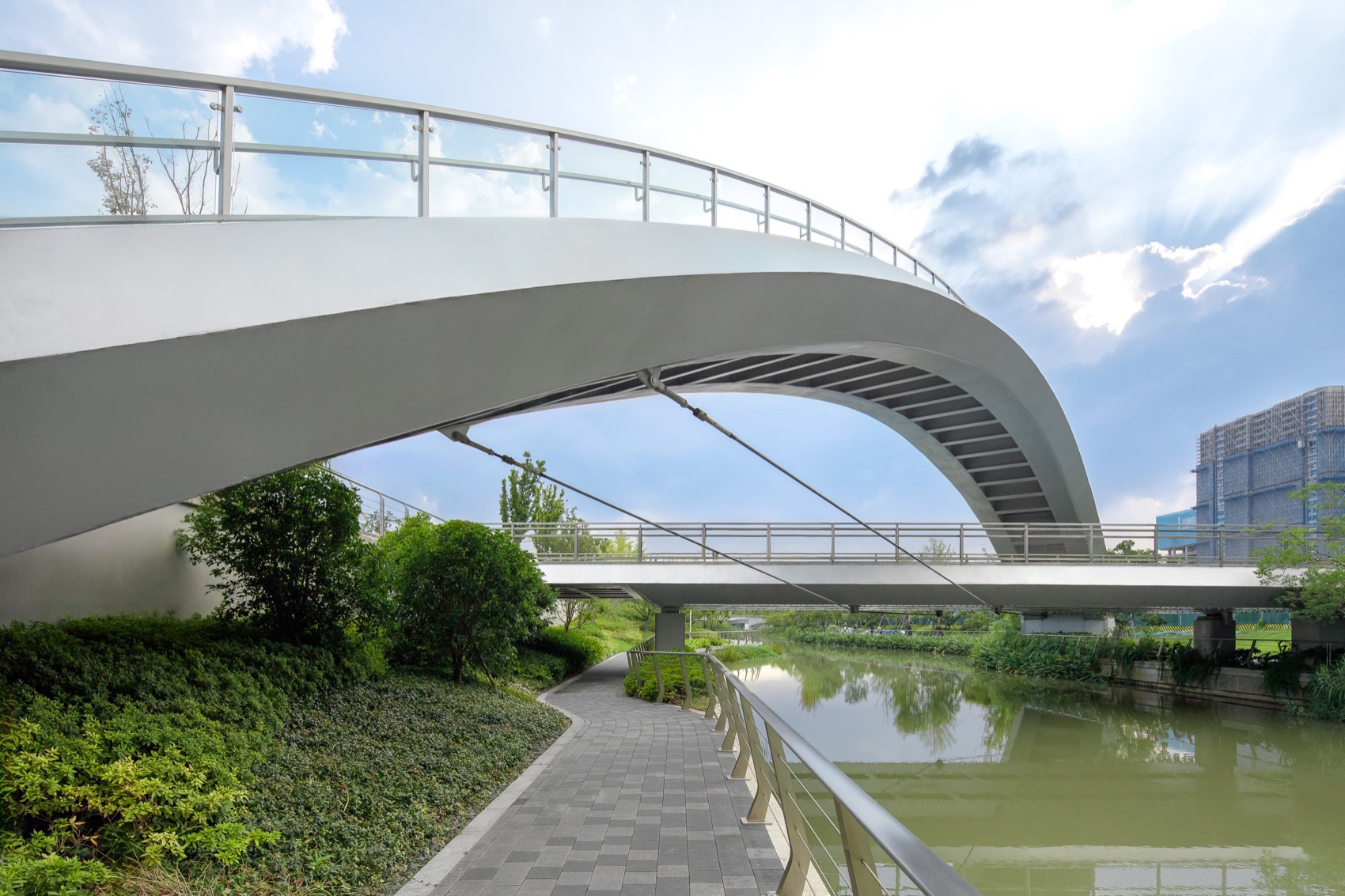 Pedestrian and vehicular bridges for Nanjing’s Nanbu New Town by NAN ...