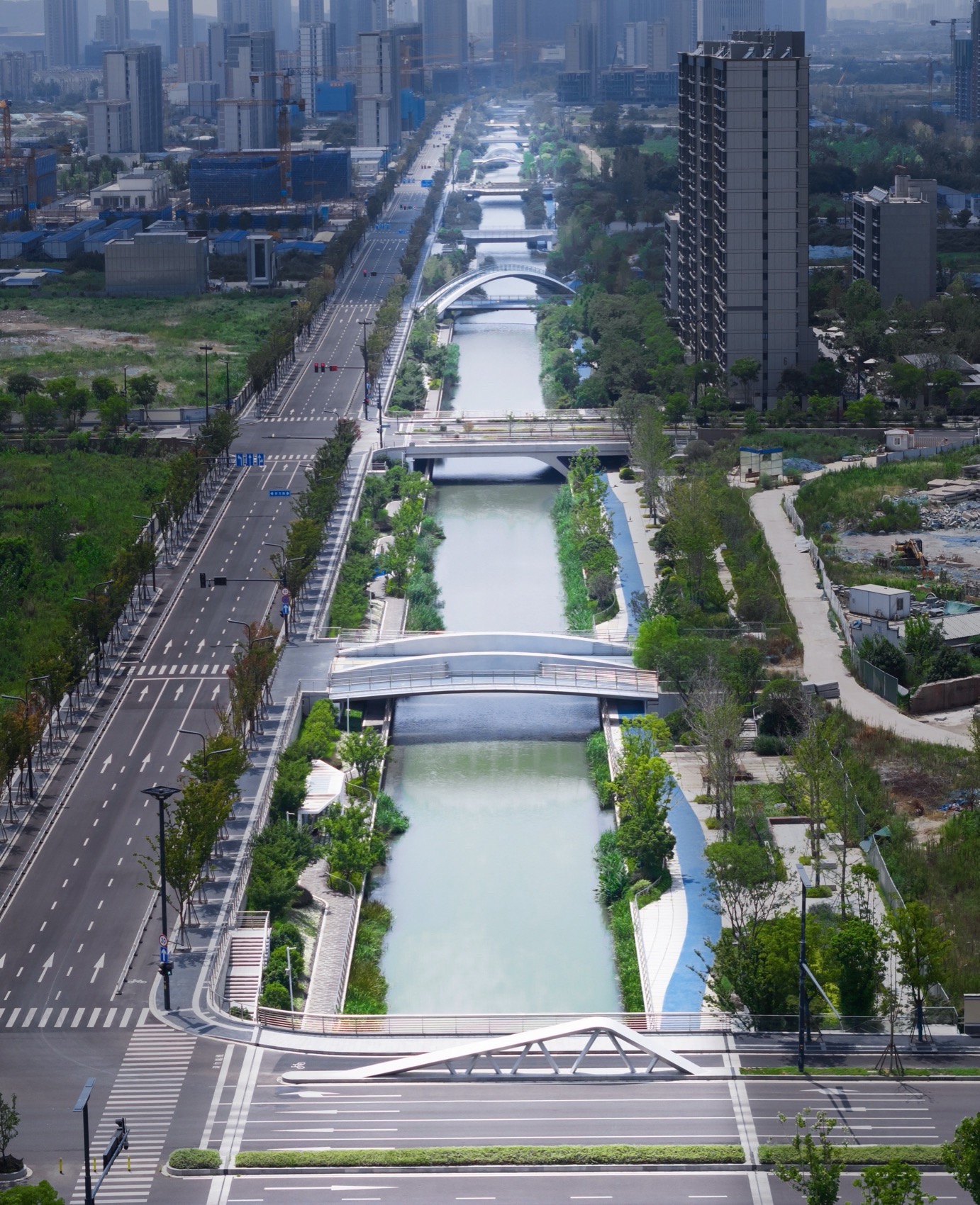 Pedestrian and vehicular bridges for Nanjing’s Nanbu New Town by NAN ...