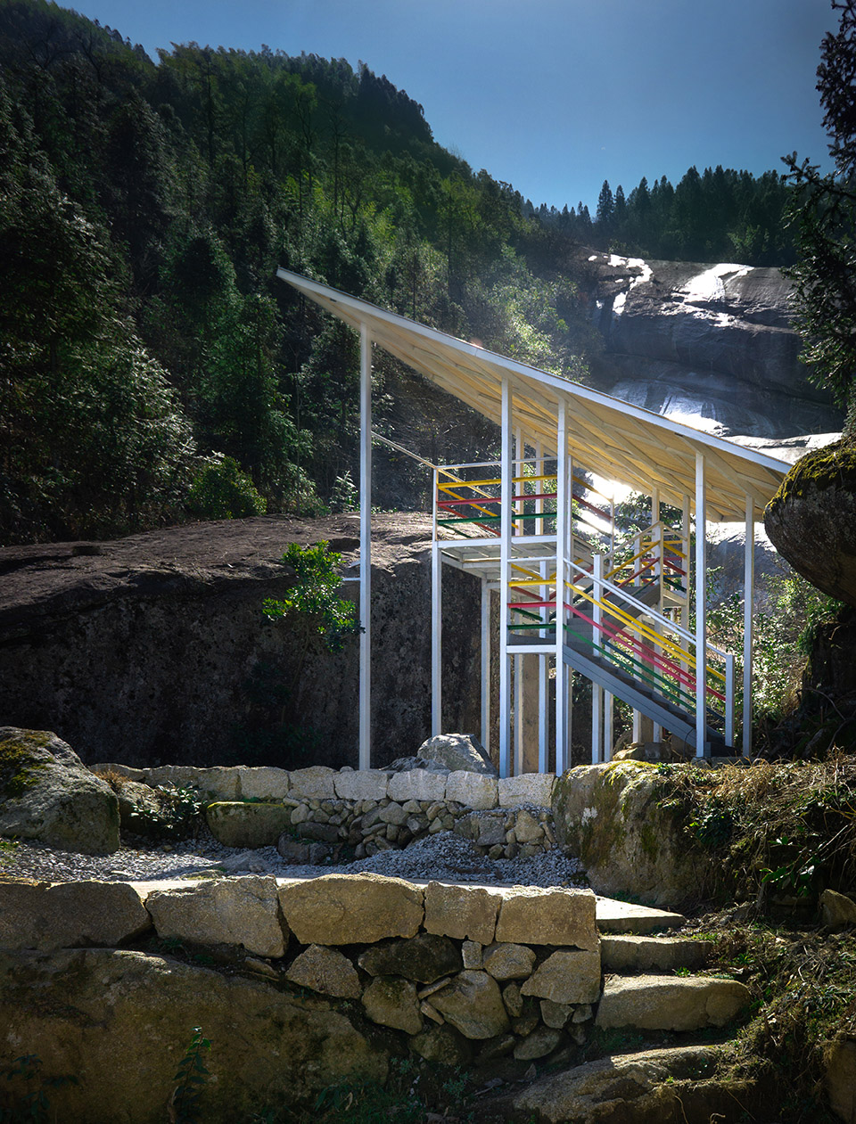 Linear steel pavilion group between the stone waterfalls in Baishuidong ...