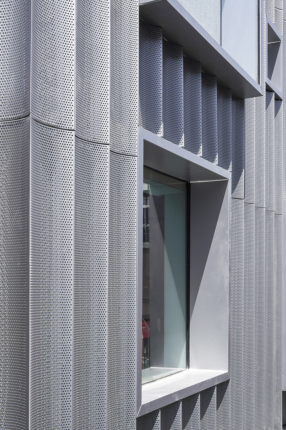 Facade and Public Space Renovation of the Street by moss.architects - 谷德设计网